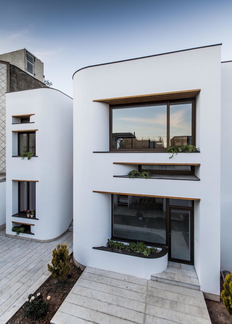 White Modern House With Curved Surfaces In Isfahan Stands Out From Its ...