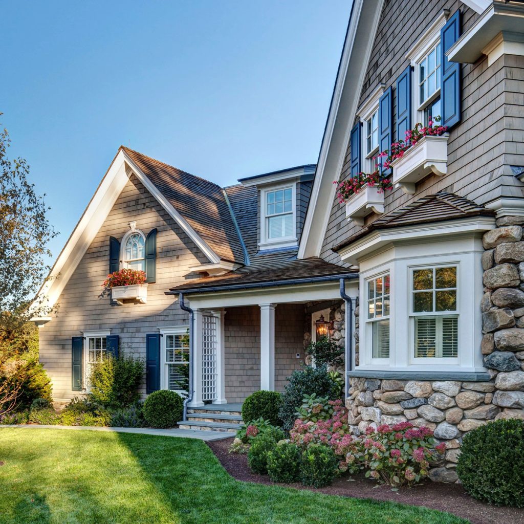 Transitional Beach Style House with New England Charm
