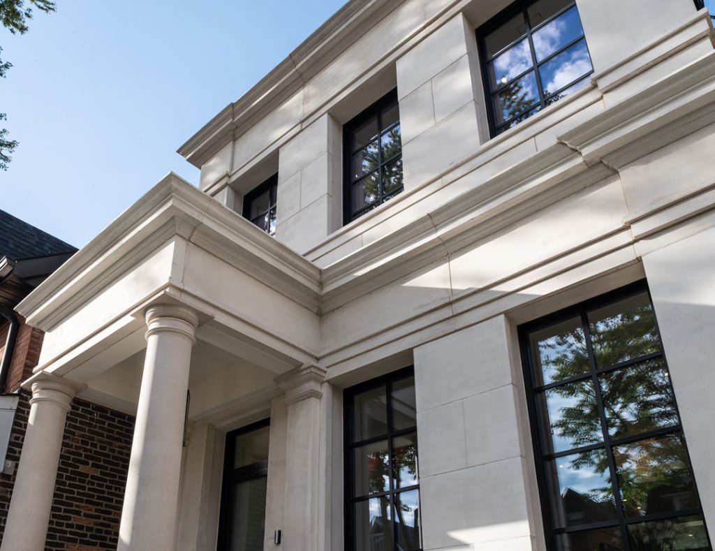 Timeless Limestone House with Classical Architectural Facade