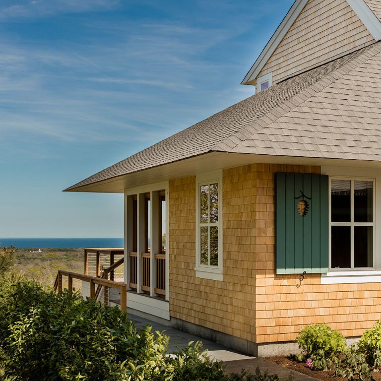 Classic Cape Cod Shingle Style Home with Whimsical Touches