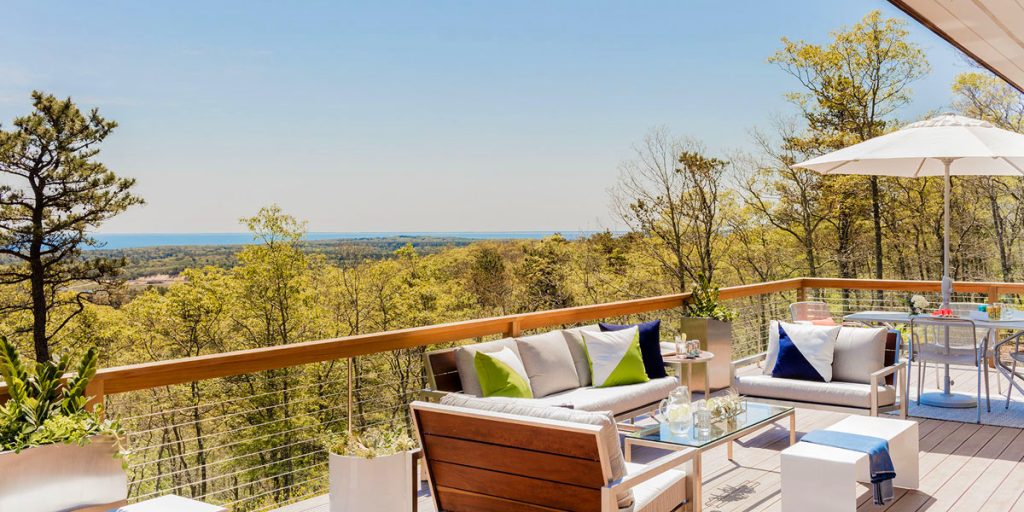 Classic Cape Cod Shingle Style Home with Whimsical Touches