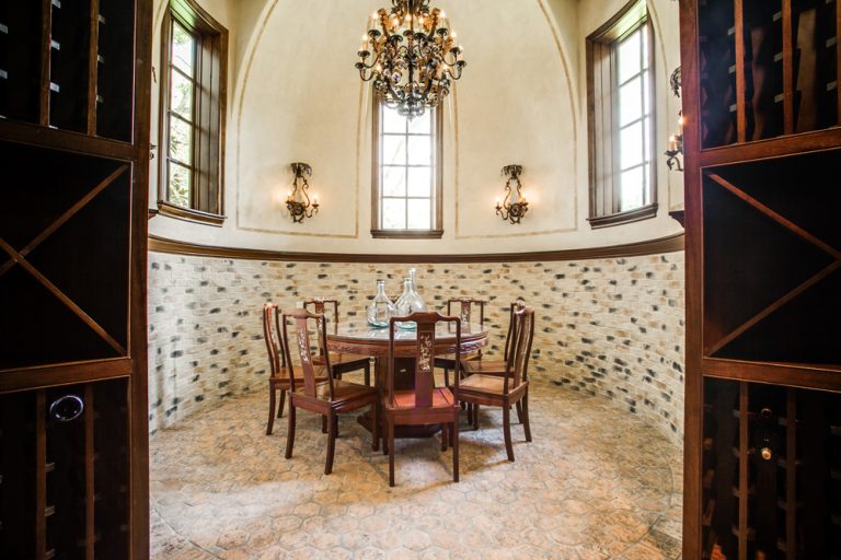 French Renaissance Chateau Style Mansion with Elegant Curb Appeal