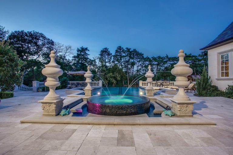 French Renaissance Chateau Style Mansion with Elegant Curb Appeal