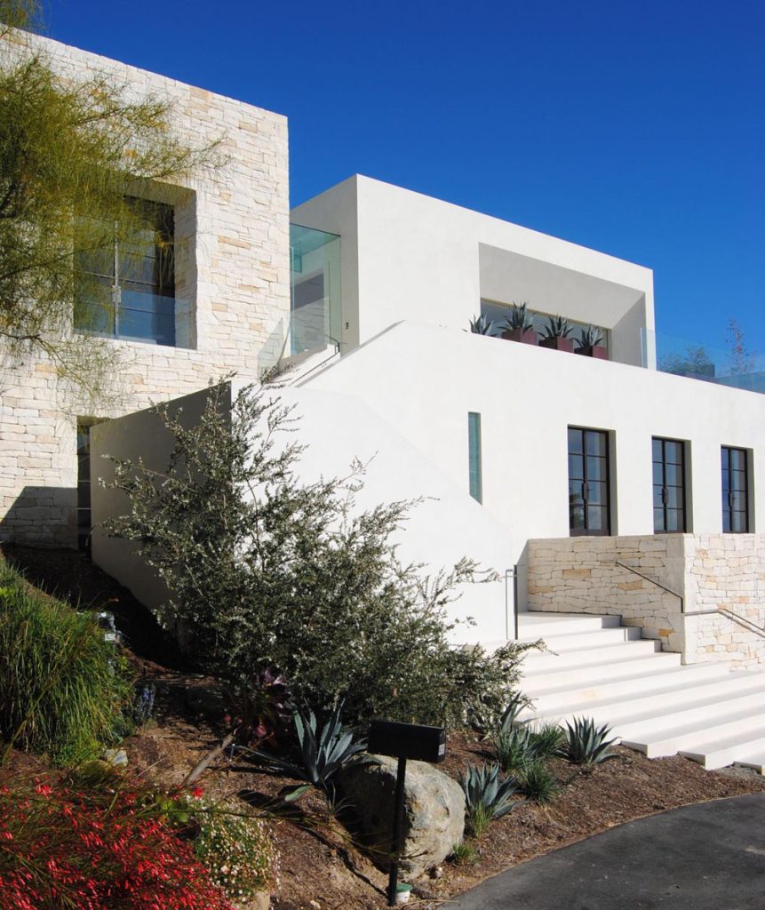 Romantic Modern Oceanfront Stone and Stucco House