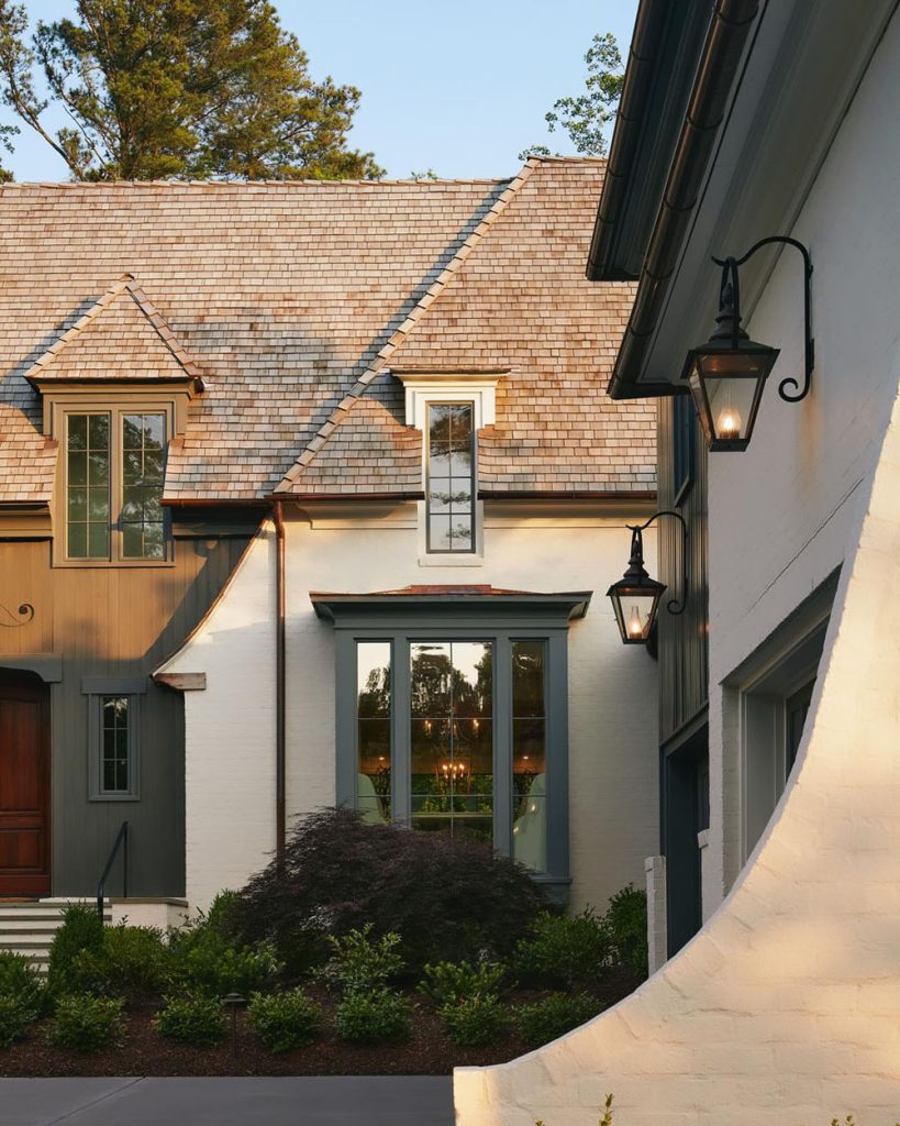 Urban Retreat with Modern Tudor Style Transitional Architecture