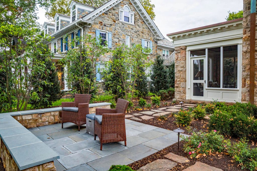 Historic Riverfront Stone House with Traditional Landscaping