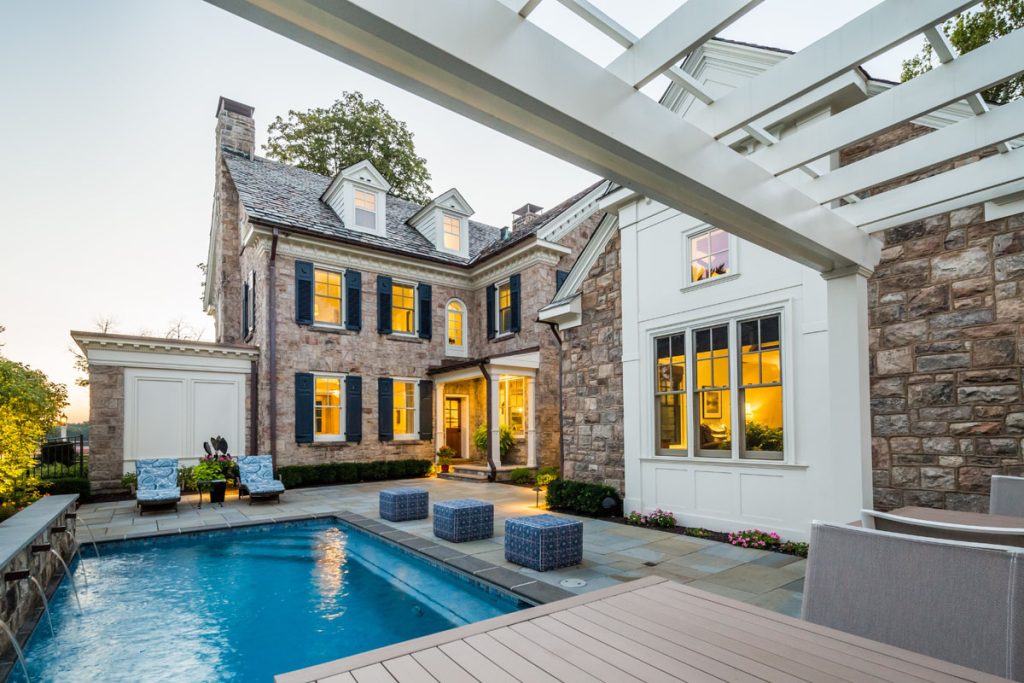 Historic Riverfront Stone House with Traditional Landscaping