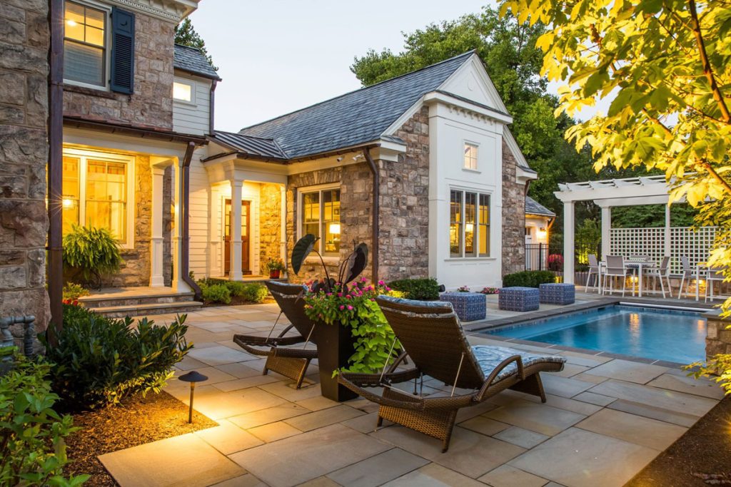 Historic Riverfront Stone House with Traditional Landscaping