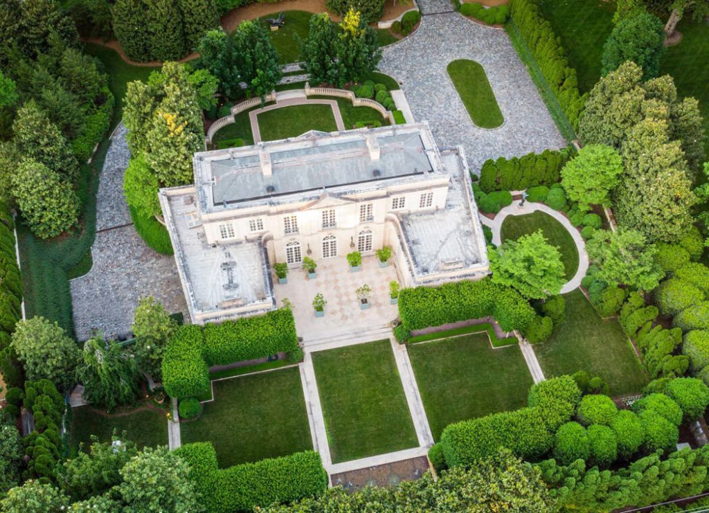Neoclassical Mansion Surrounded by Beautifully Manicured Gardens
