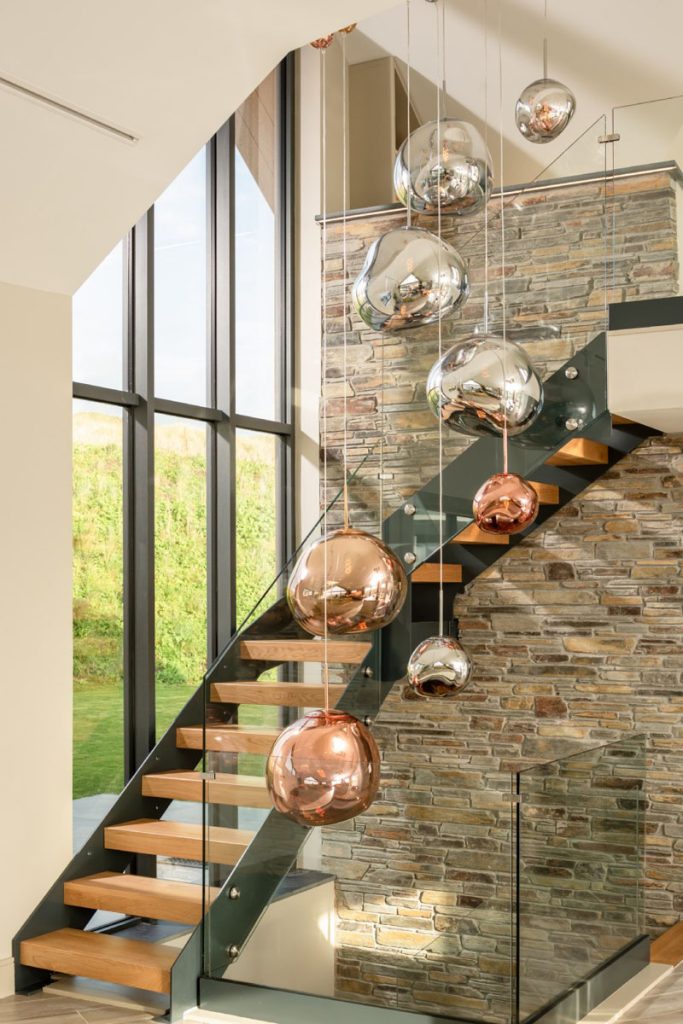 Dramatic Modern Stone Beach House with Glass Façade