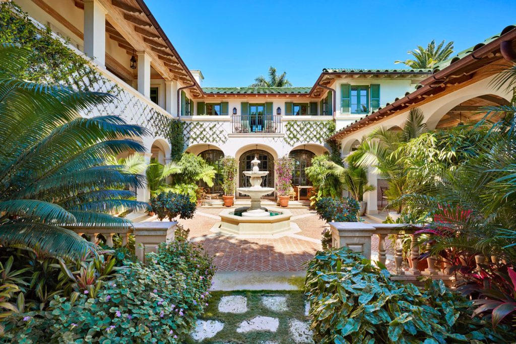 Courtyard Style Villa in Florida with Mediterranean Architecture
