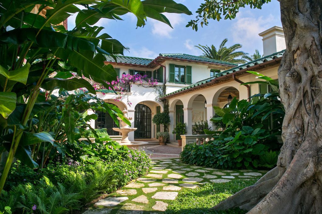 Courtyard Style Villa in Florida with Mediterranean Architecture