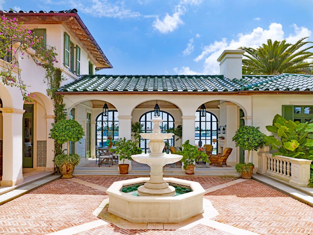 Courtyard Style Villa in Florida with Mediterranean Architecture