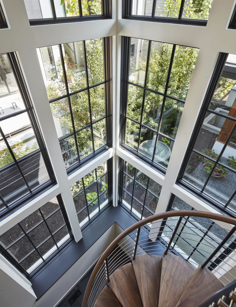 Modern Mediterranean Home Makeover Adds a New Corner Tower