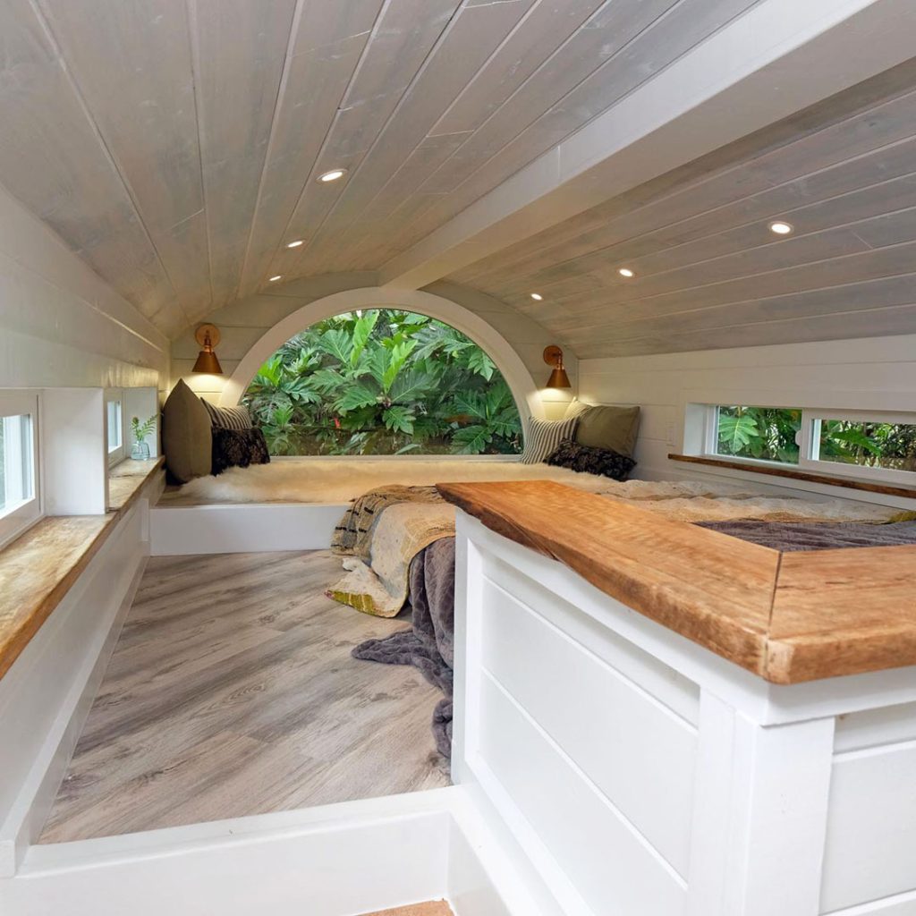 Unique Tiny House on Wheels with Large Round Window