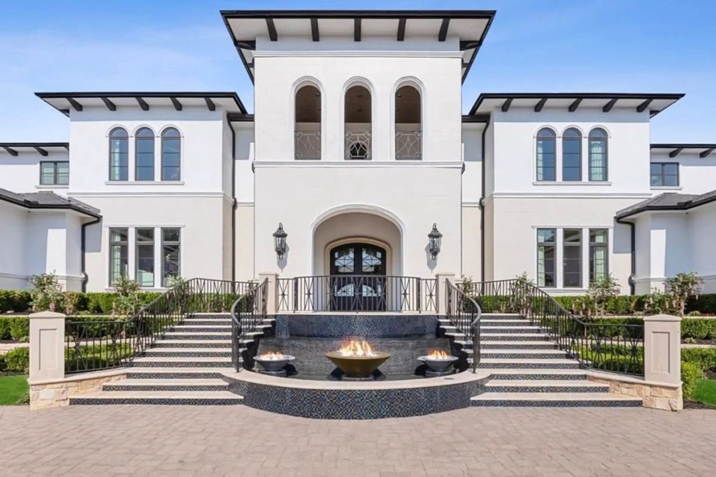 Transitional Mediterranean Home with Symmetrical Architecture