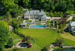 Waterfront Stone Mansion with French Country Architecture