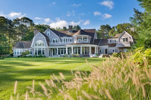 Shingle Style Cape Cod Home with Porches and Classical Columns