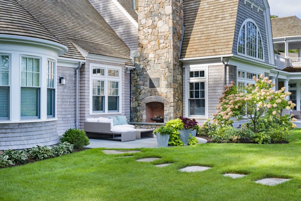 Shingle Style Cape Cod Home with Porches and Classical Columns