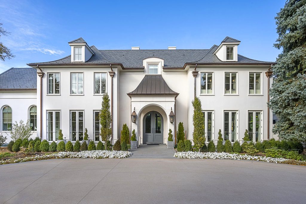 Grand Stucco-Clad Mansion Inspired by Classic French Architecture