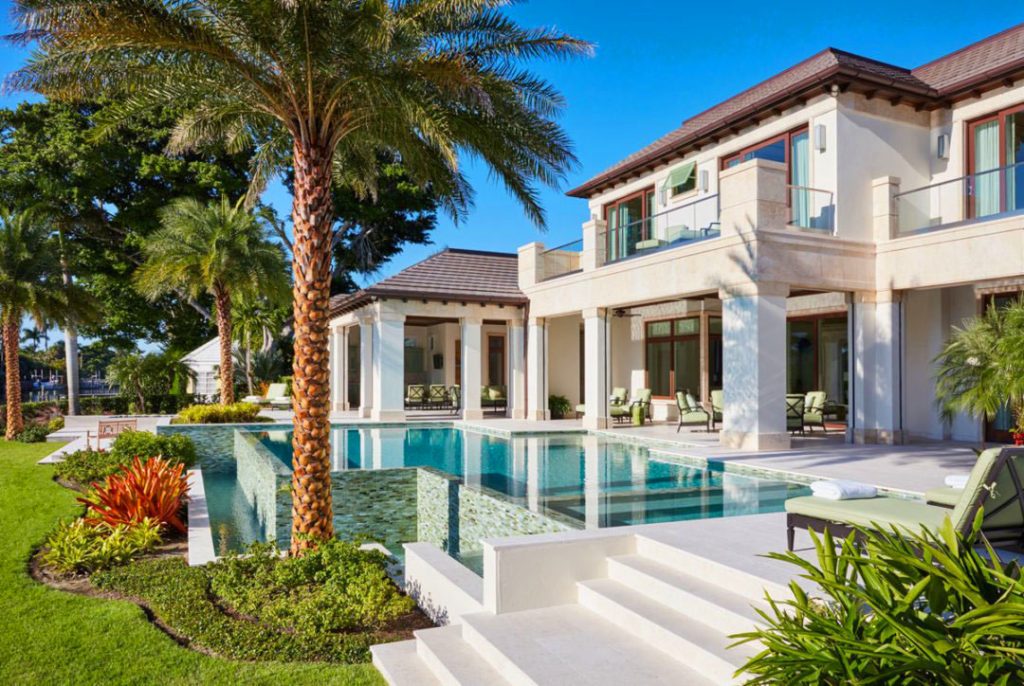 Waterfront Island-Style Home in Naples with Tropical Gardens