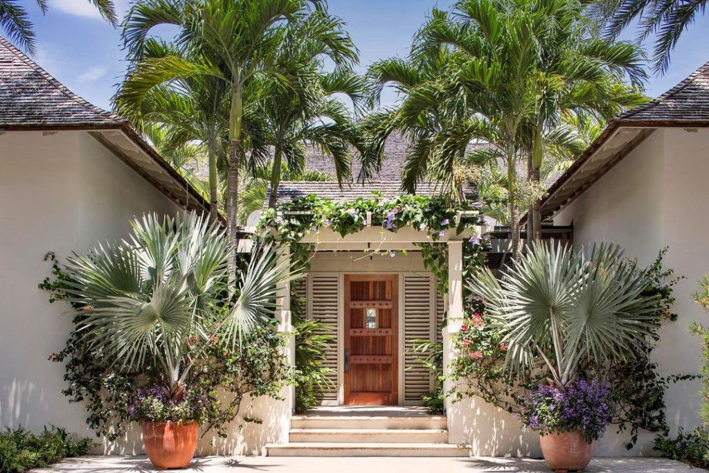 Coastal Home with Anglo-Caribbean Style Tropical Architecture